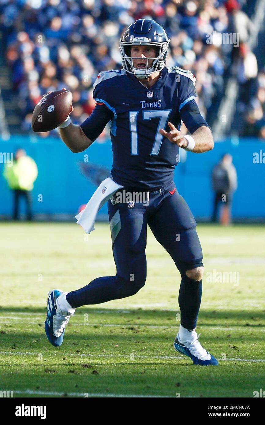 Tennessee Titans quarterback Ryan Tannehill (17) heads to the end zone ...