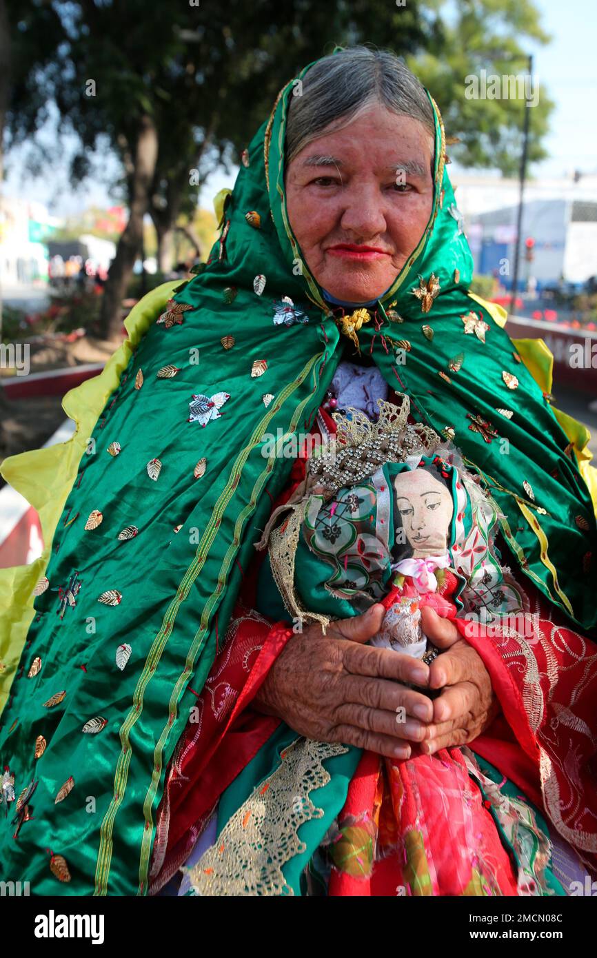 Ana Rita Ruelas, 65, dressed in a costume alluding to the Virgin of ...