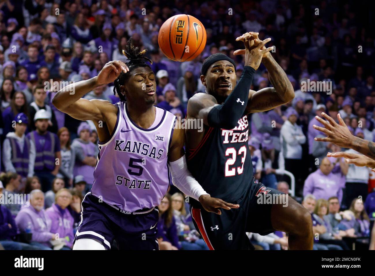 Texas Tech guard De'Vion Harmon (23) loses the ball as he is pressured ...