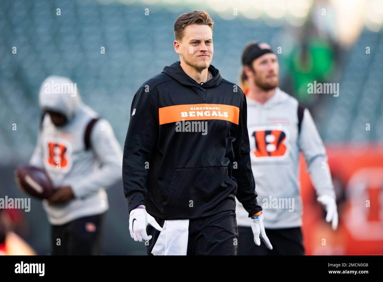 Cincinnati Bengals quarterback Joe Burrow (9) walks off the field after ...