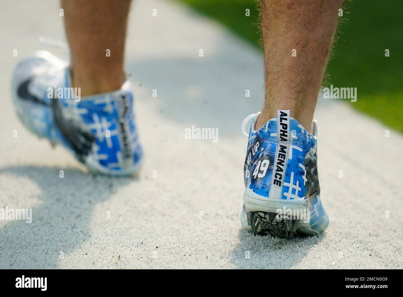The cleats of Los Angeles Chargers middle linebacker Drue Tranquill are ...