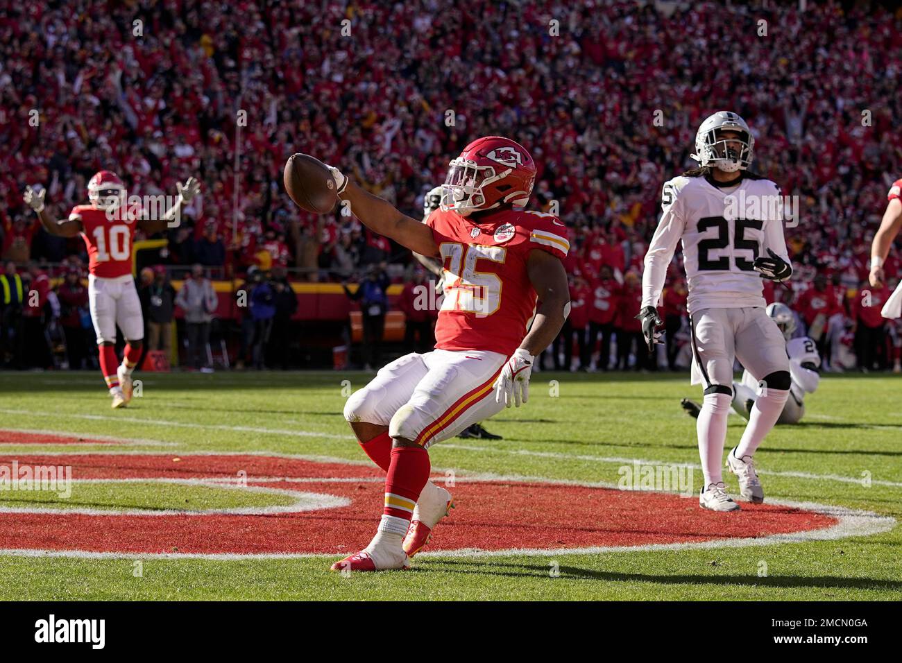 Kansas City Chiefs running back Clyde Edwards-Helaire, left, celebrates ...