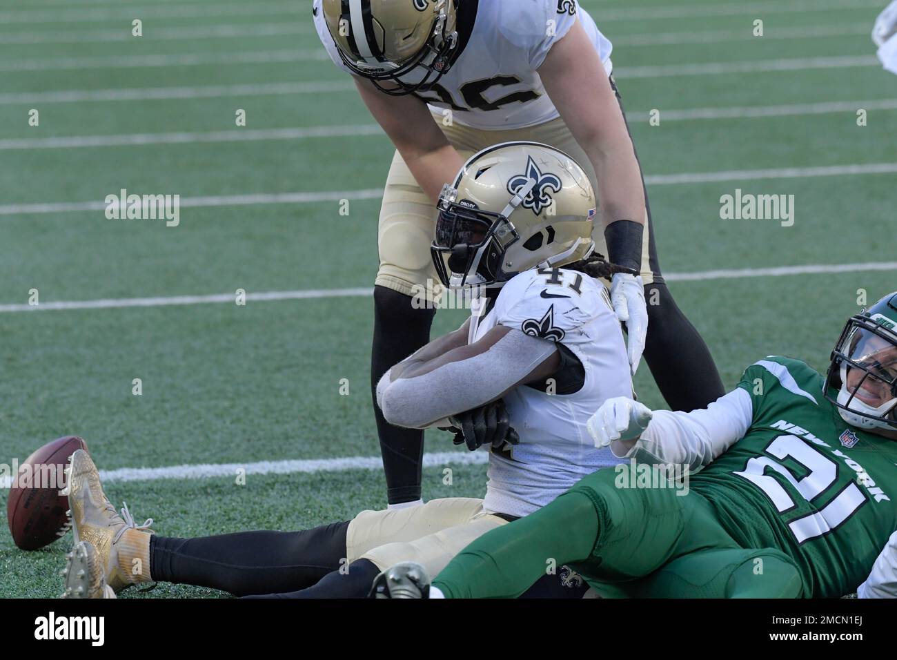 New Orleans Saints' Alvin Kamara, center celebrates after scoring a ...
