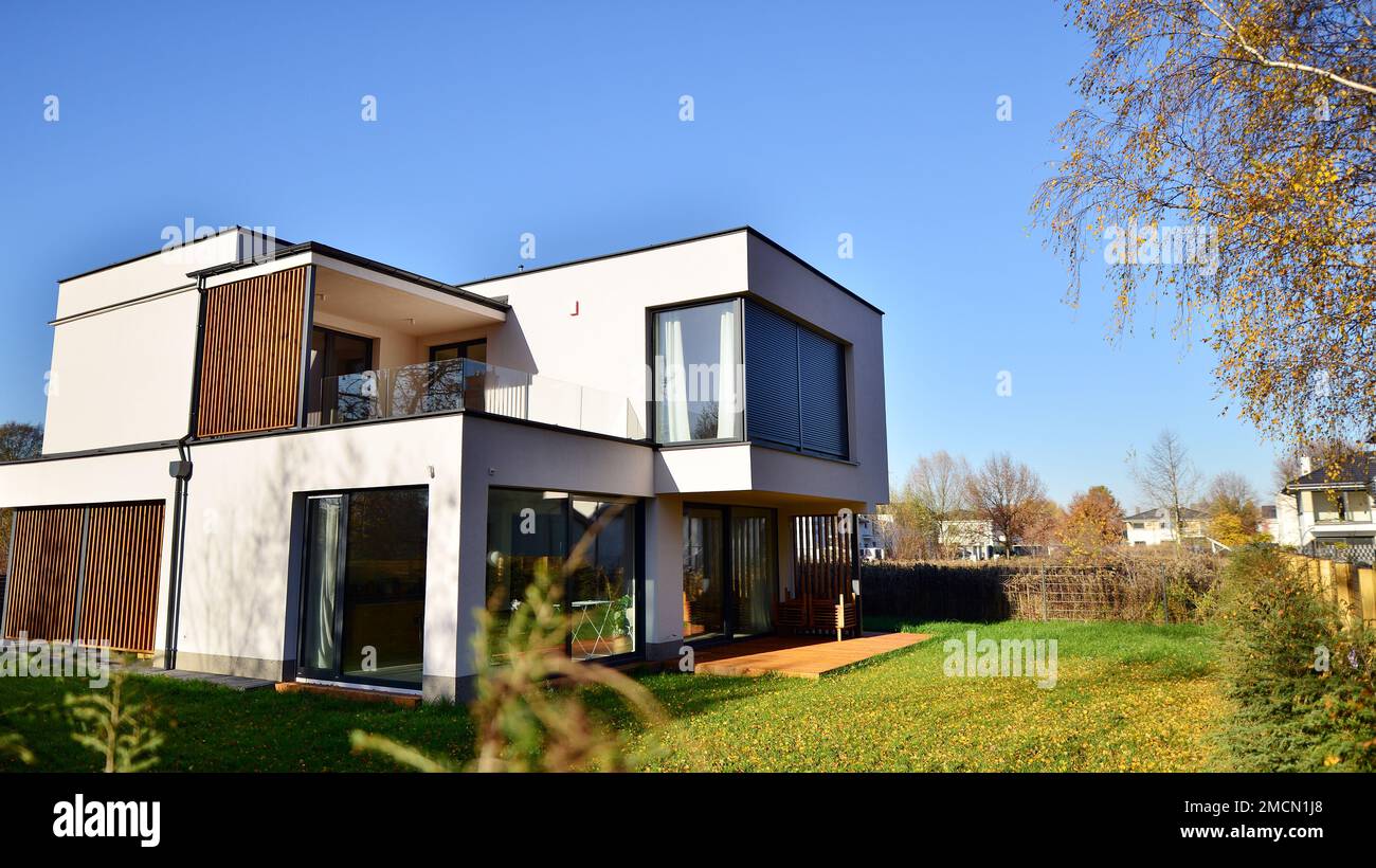 Cubist architecture. Cozy and modern house with garage and cobblestone ...