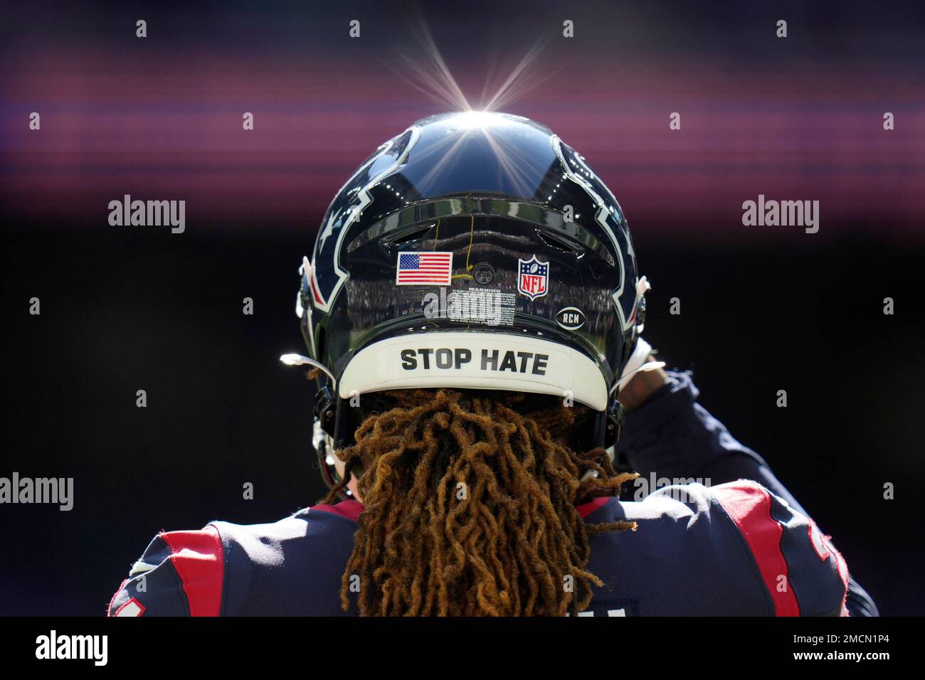 Light reflects off the helmet of Houston Texans cornerback Tremon Smith ...