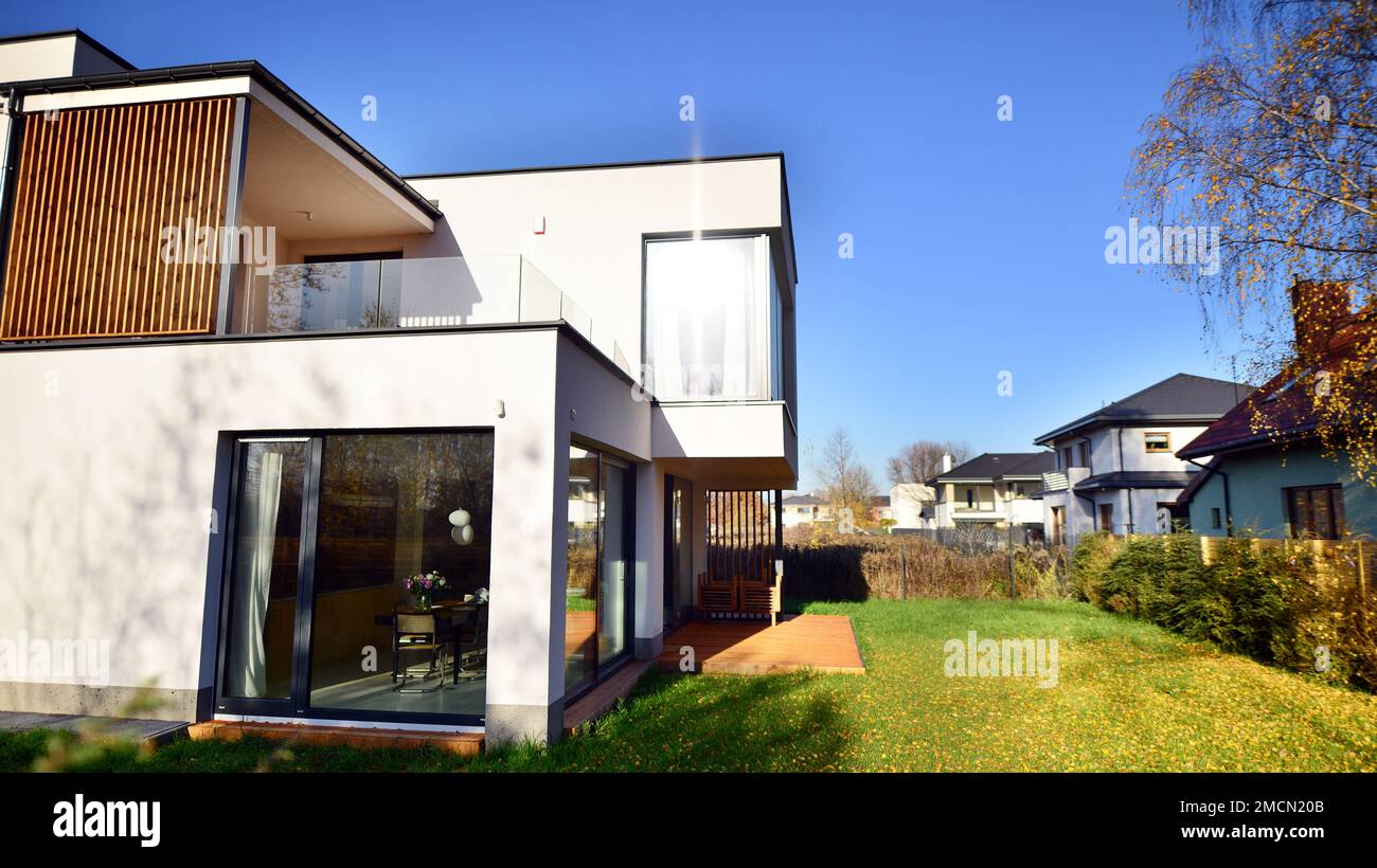 Cubist architecture. Cozy and modern house with garage and cobblestone ...