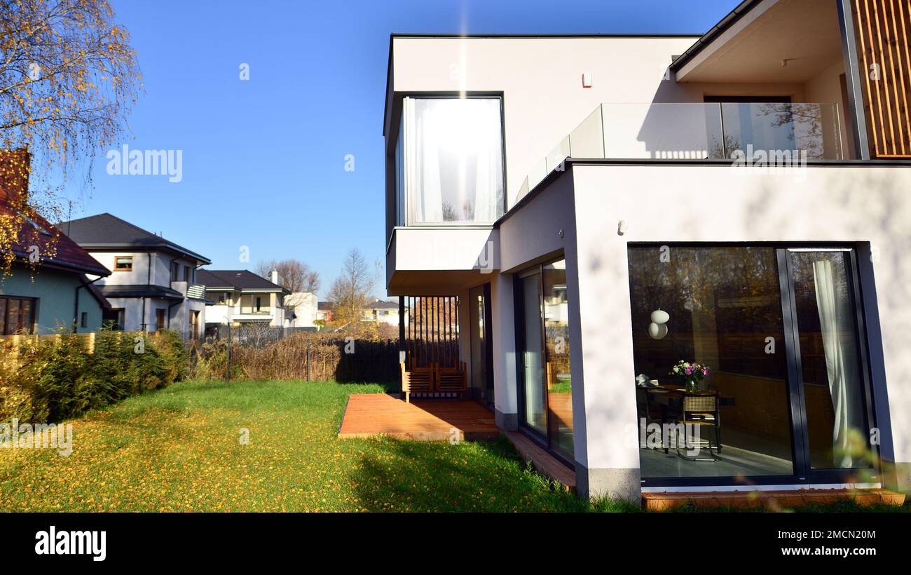 Cubist architecture. Cozy and modern house with garage and cobblestone ...
