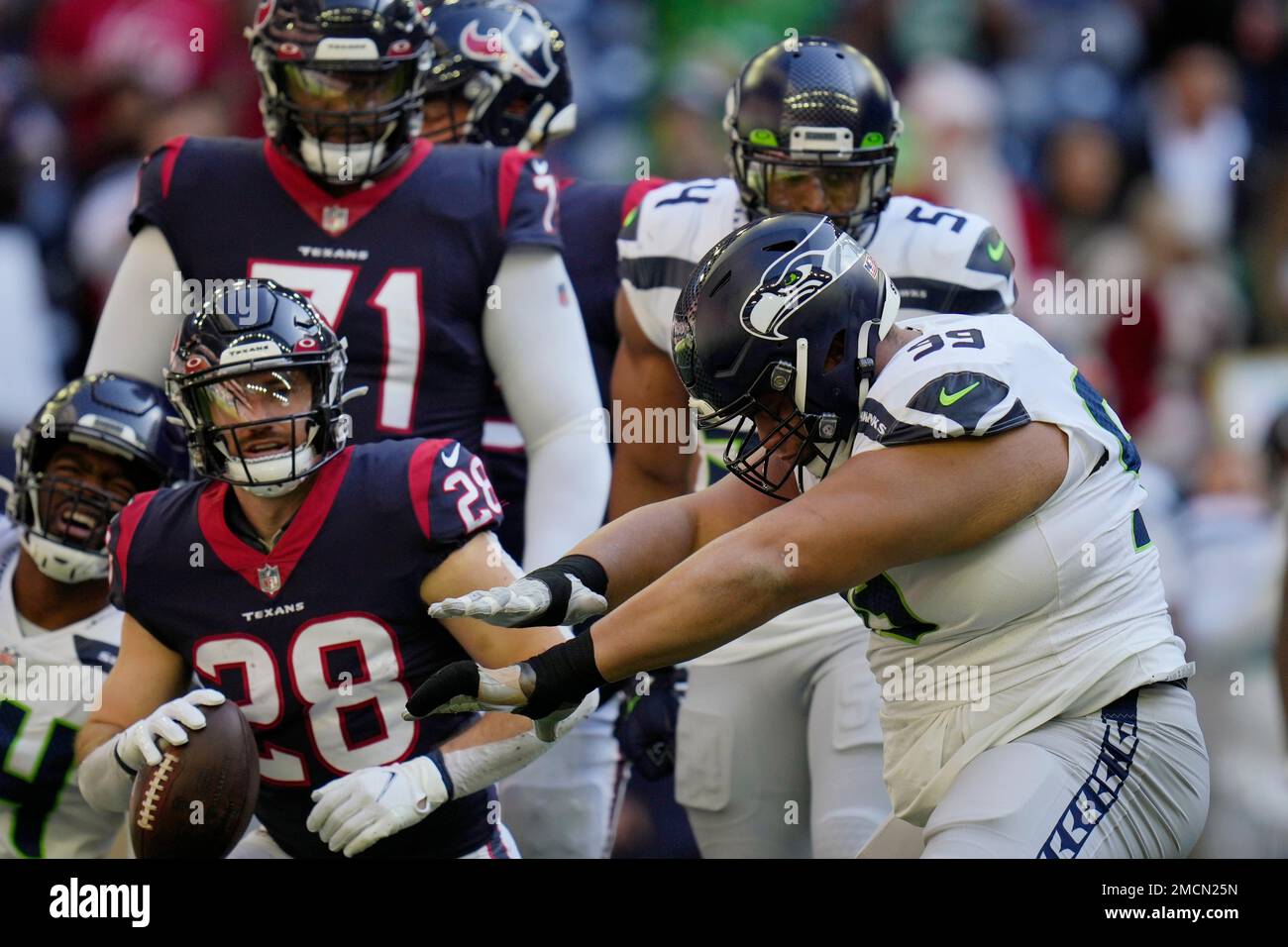 Seattle Seahawks defensive tackle Al Woods (99) celebrates after ...