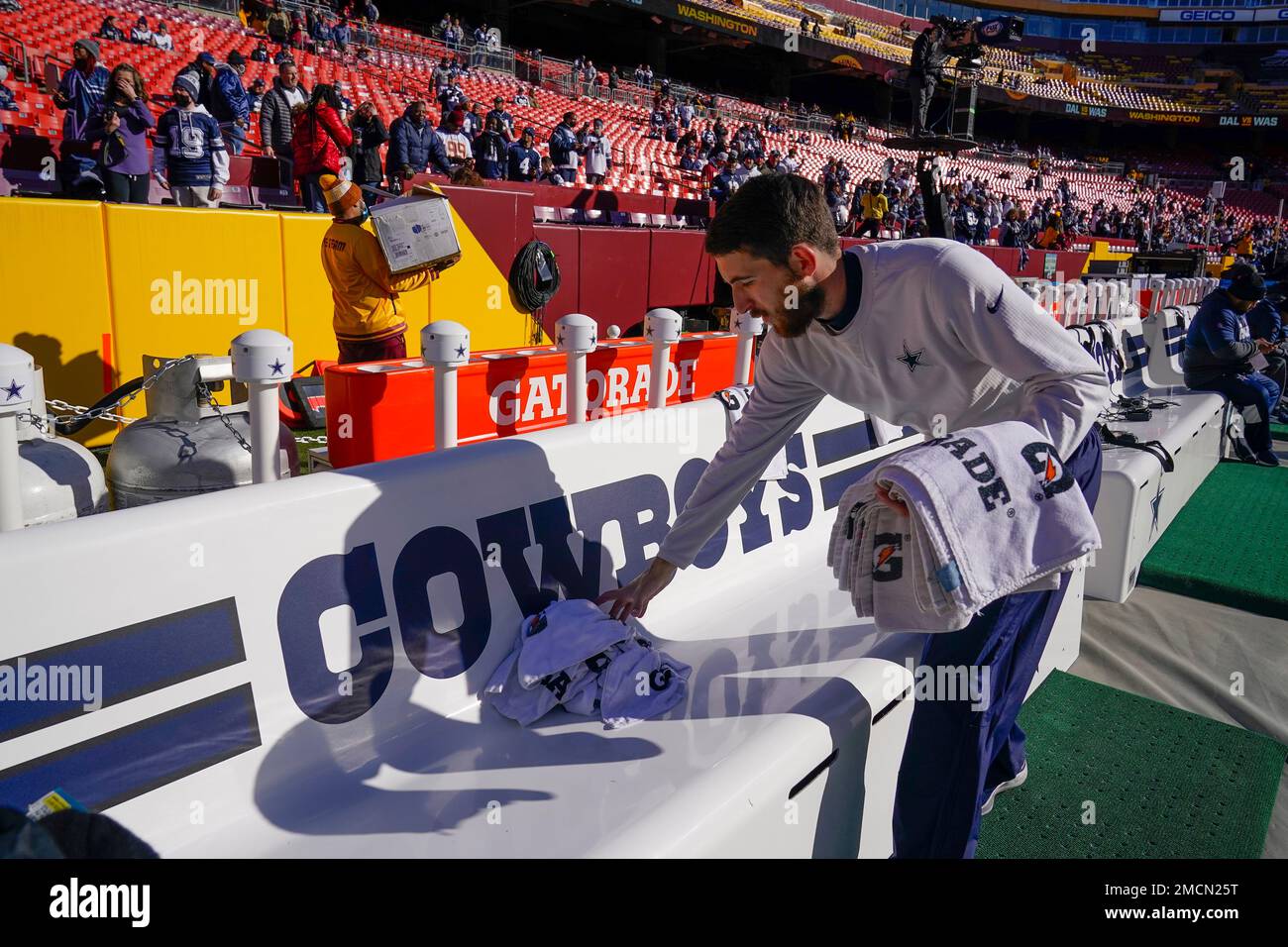 The team benches for the Dallas Cowboys are prepped for their use prior ...