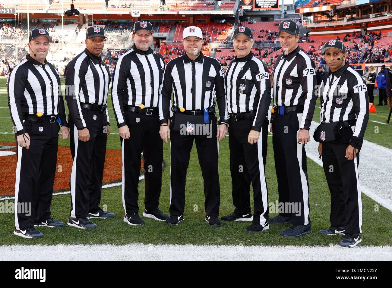 NFL officials crew field judge Aaron Santi, left to right, back Judge ...