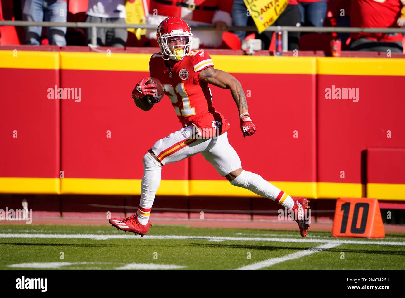 Kansas City Chiefs cornerback Mike Hughes runs a fumble recovery back ...
