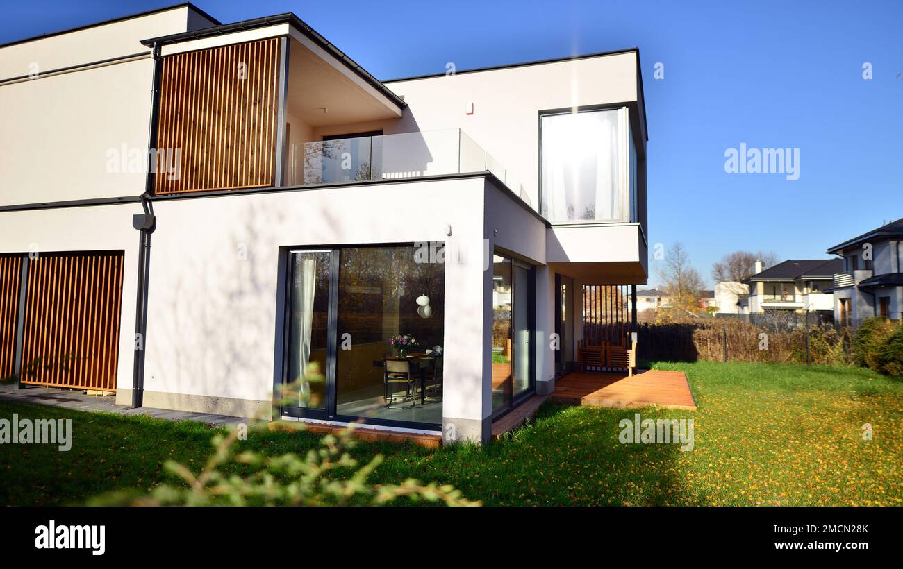 Cubist architecture. Cozy and modern house with garage and cobblestone ...