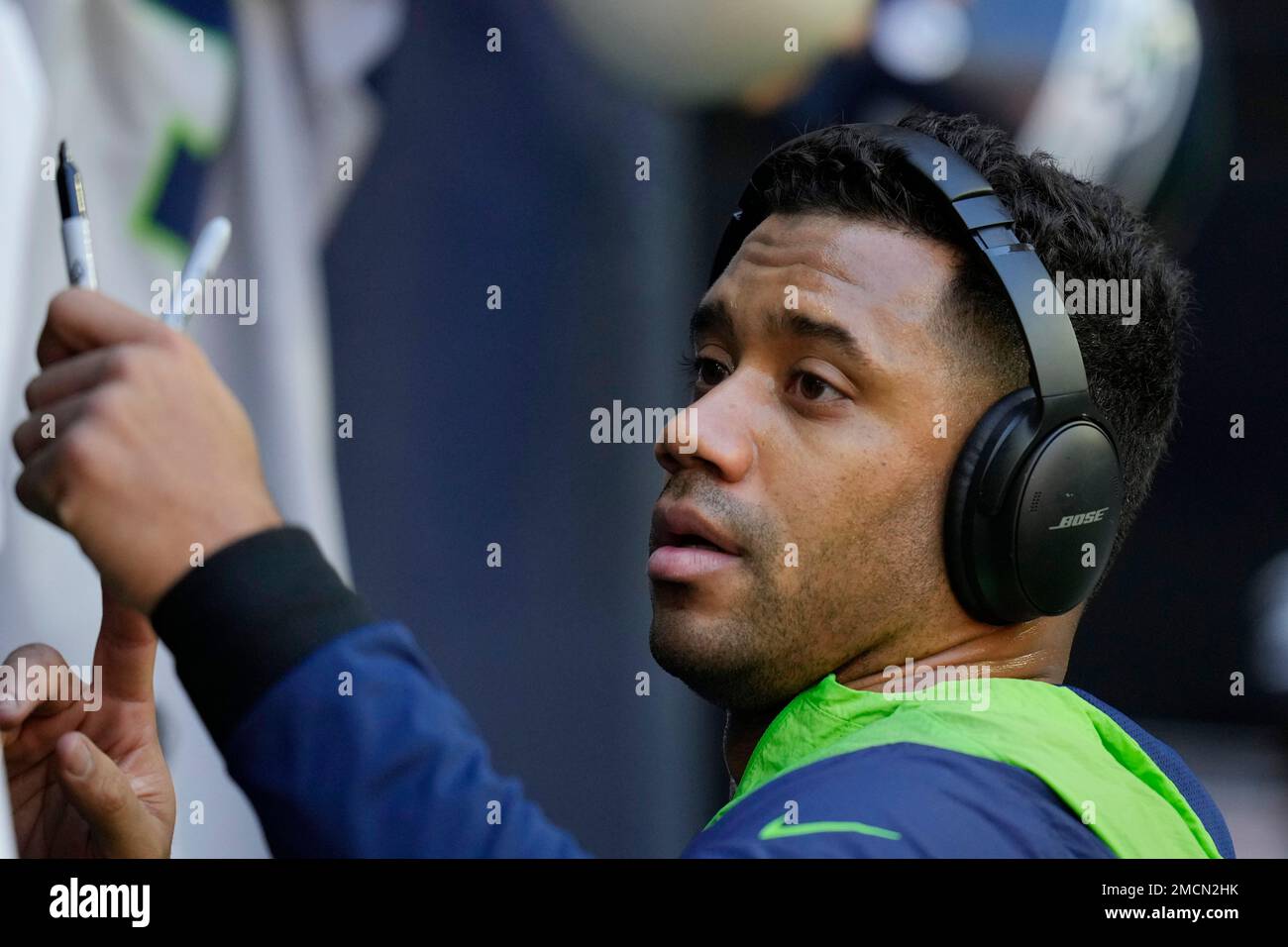 Seattle Seahawks quarterback Russell Wilson (3) interacts with fans ...