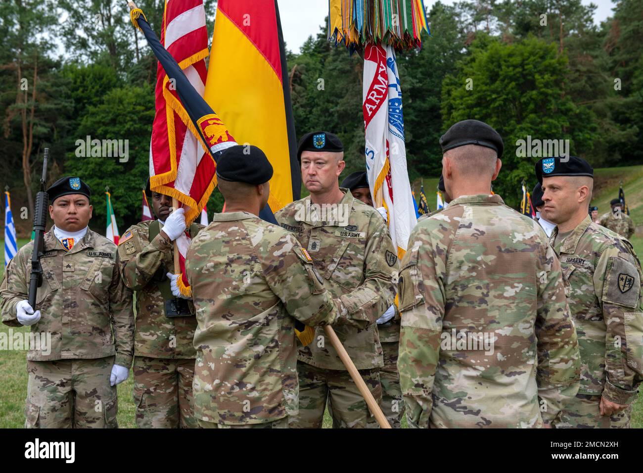 U.S. Army Col. Troy V. Alexander (left), commander passes the unit ...