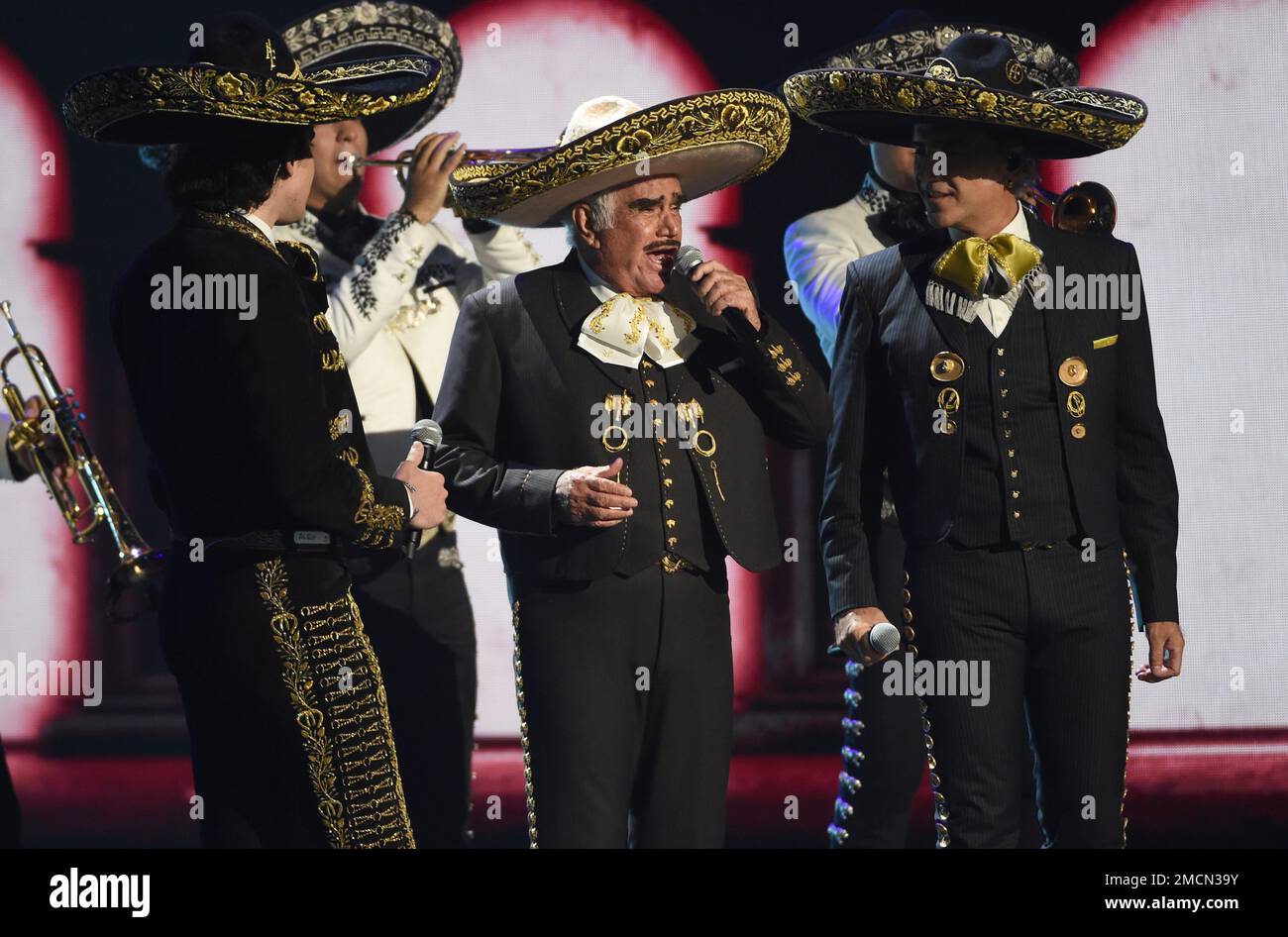 FILE - Vicente Fernandez, center, performs with his son Alejandro ...