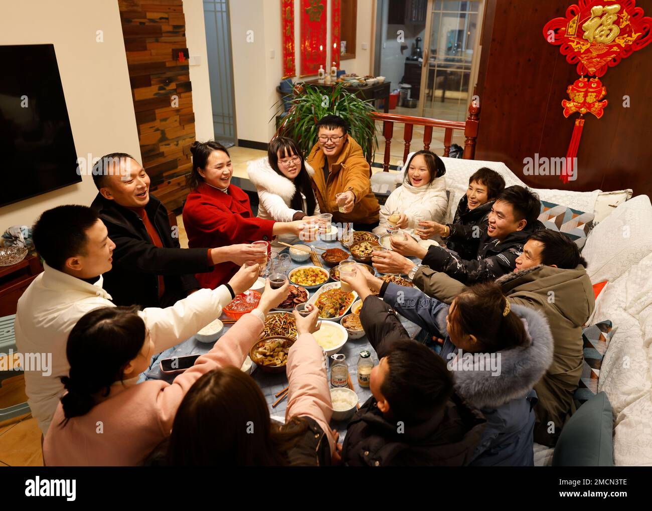 Beijing, China's Guizhou Province. 21st Jan, 2023. People enjoy a feast ...