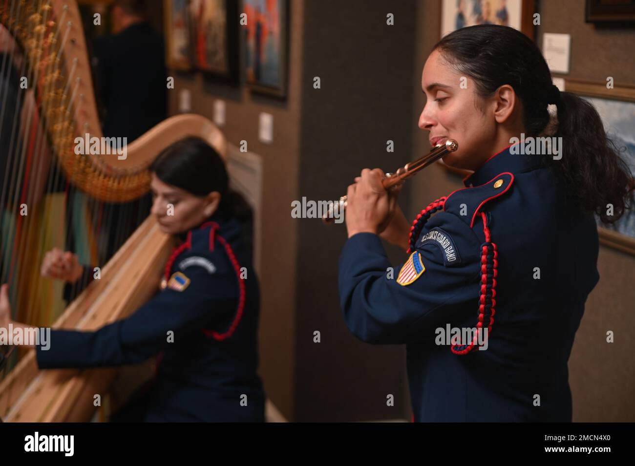 U.S. Coast Guard Band members Petty Officer 1st Class Meera Gudipati ...