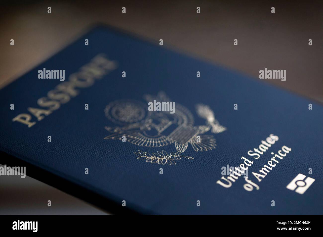 The cover of a U.S. Passport is displayed in Tigard, Ore., Saturday ...