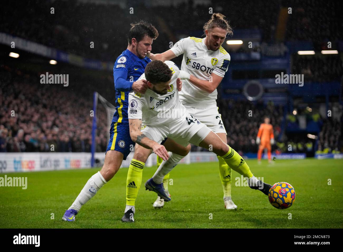 Chelsea's Mason Mount, left, challenges for the ball with Leeds United ...