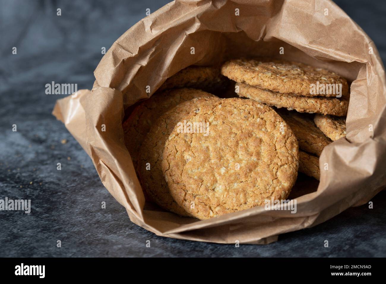 Oat biscuits cookies in a brown paper bag. Eco friendly recycling ...