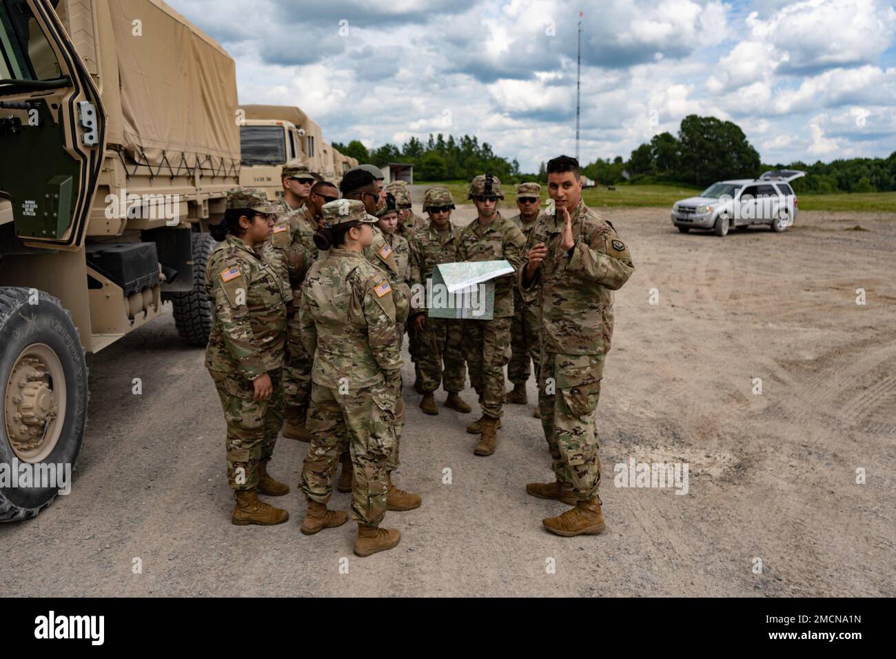 Spc. Michael Puccio shows the direction of travel during a route ...