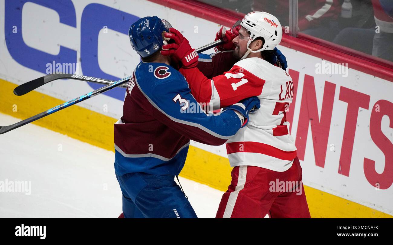 Detroit Red Wings center Dylan Larkin, right, squares off in a scrum ...
