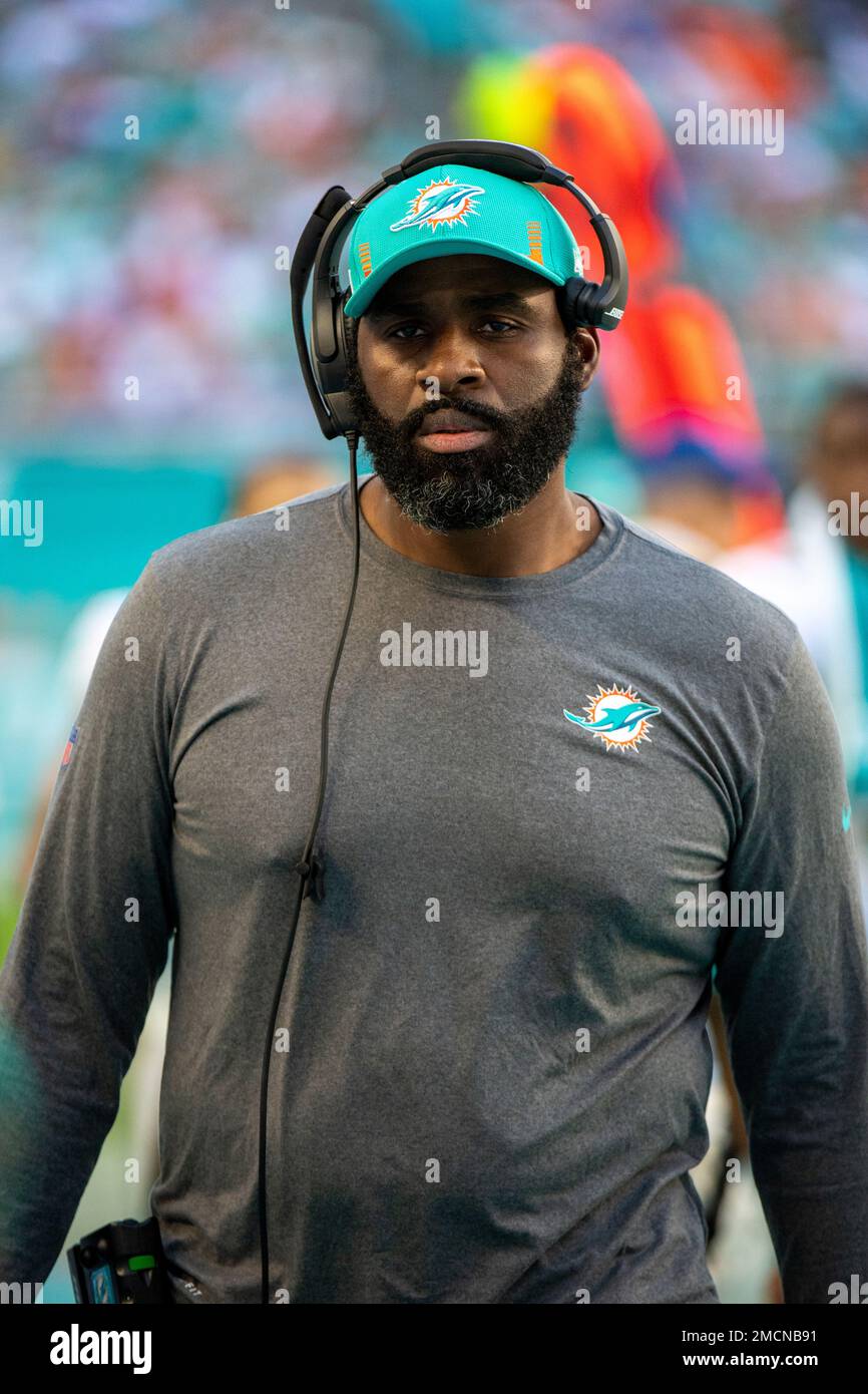Miami Dolphins offensive line coach Lemuel Jeanpierre walks on the ...