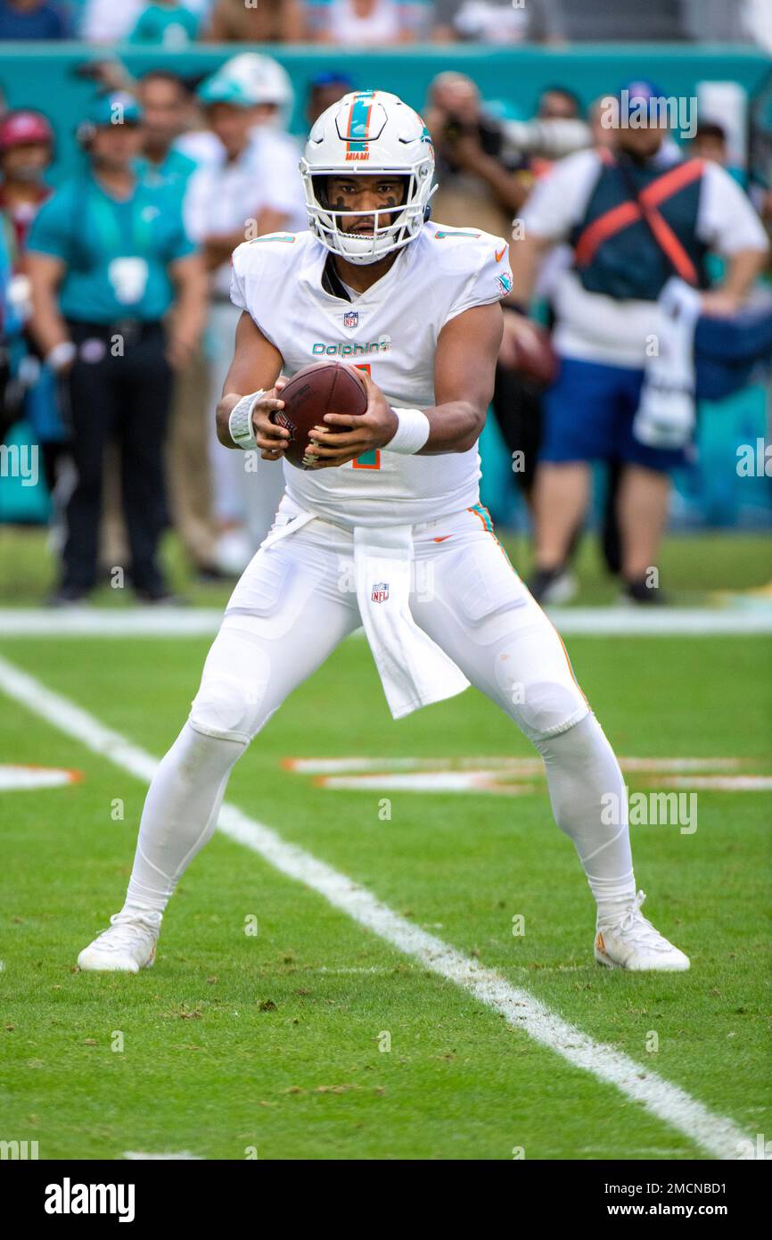 Miami Dolphins quarterback Tua Tagovailoa (1) looks to throw the ball ...