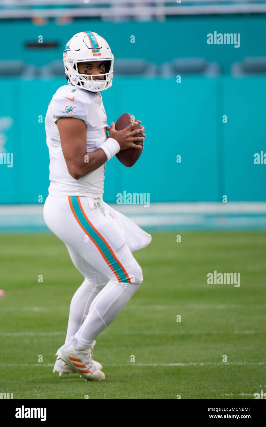 Miami Dolphins quarterback Tua Tagovailoa (1) looks to throw the ball ...