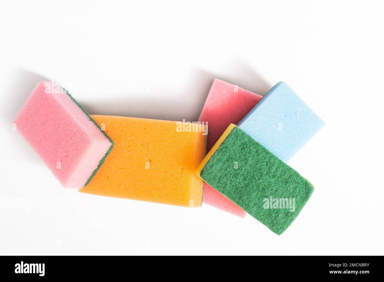 Multi-colored sponges for dishes Isolated on a white background Stock ...