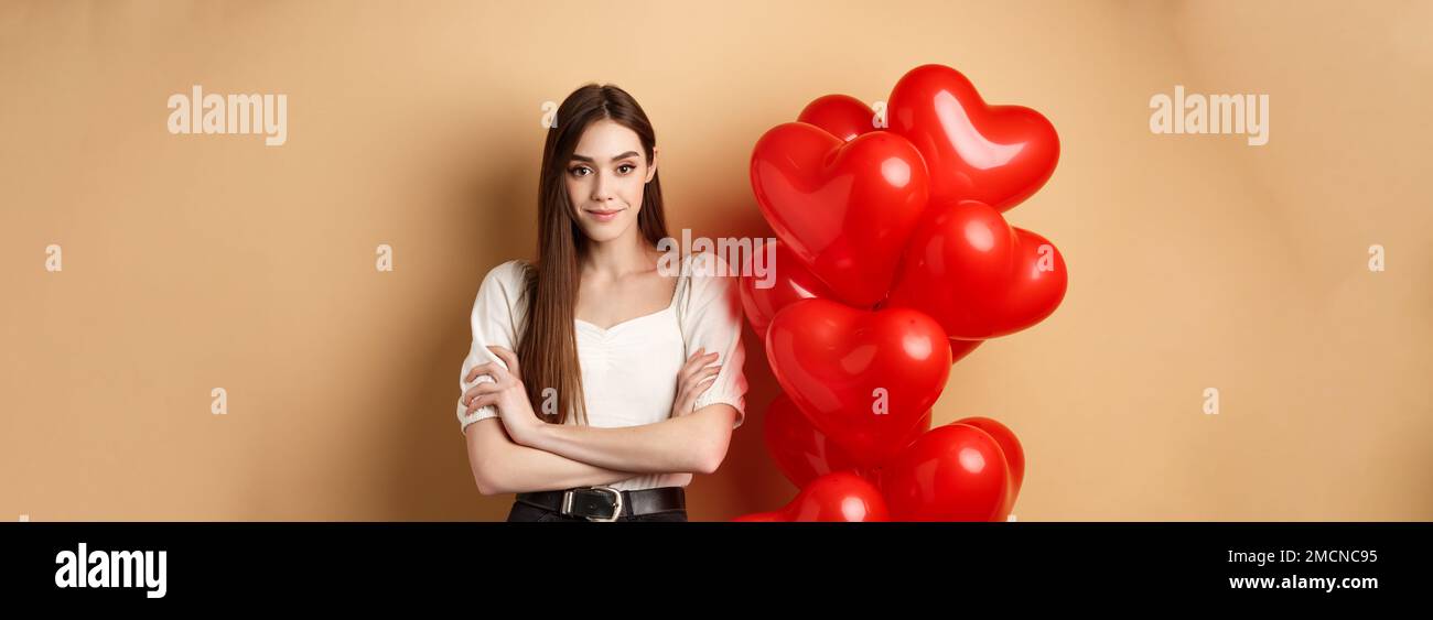 Sassy young girl cross arms on chest and smiling confident, standing ...