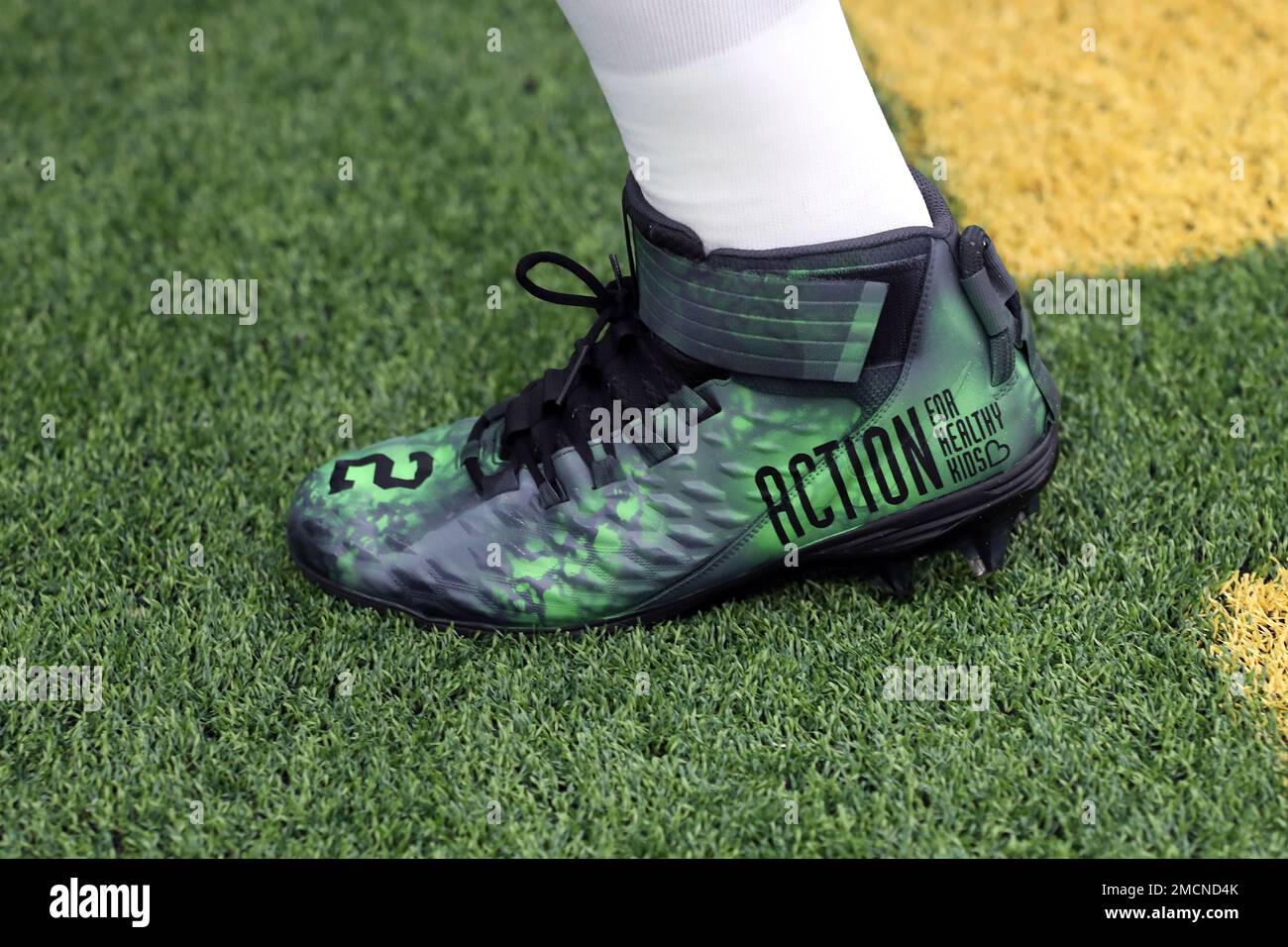 The cleats of Indianapolis Colts guard Chris Reed (62) are seen before ...