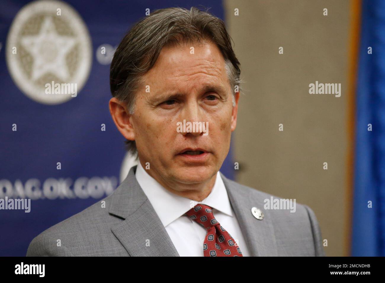 FILE - Oklahoma Attorney Gen. Mike Hunter speaks during a news ...