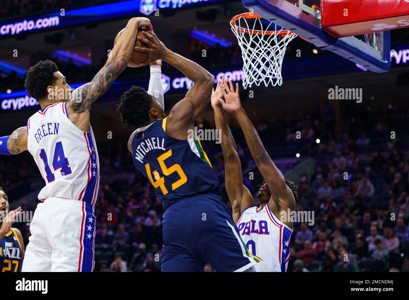 Utah Jazz's Donovan Mitchell, center, gets his shot blocked by ...