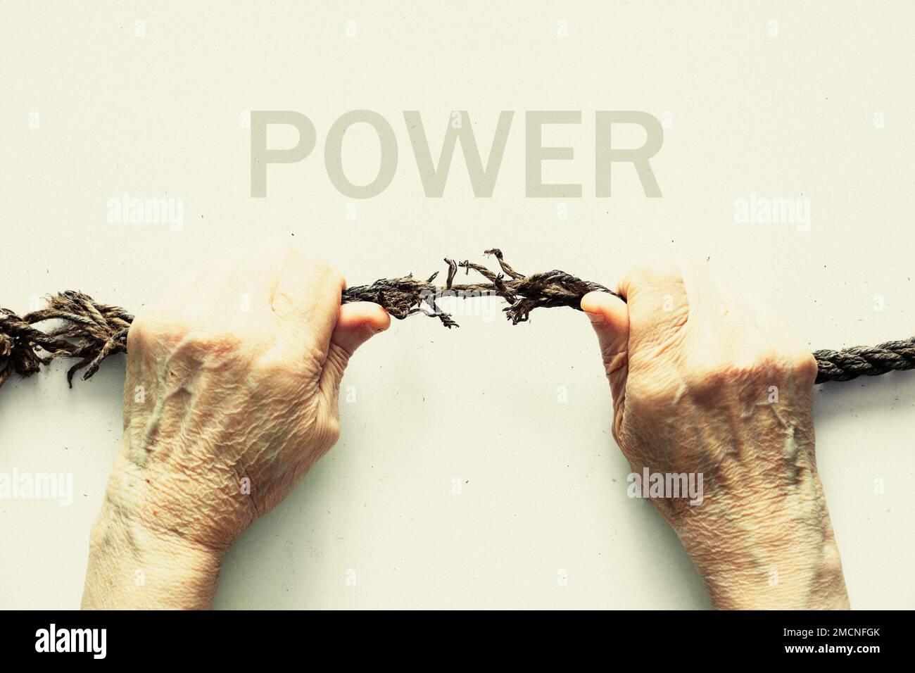 hands pull an old rope on a white background, human strength Stock ...