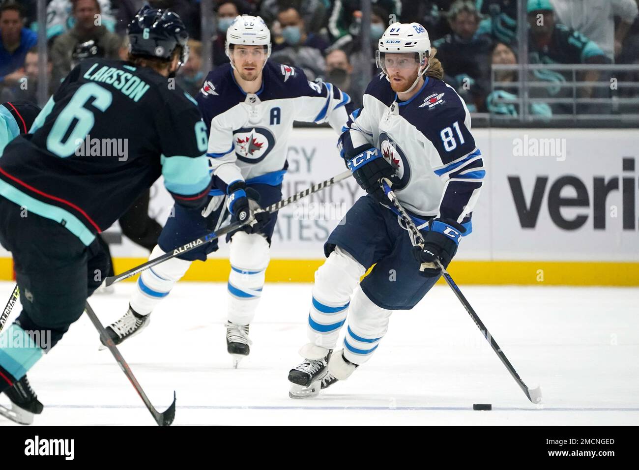 Winnipeg Jets' Kyle Connor (81) moves the puck against the Seattle ...