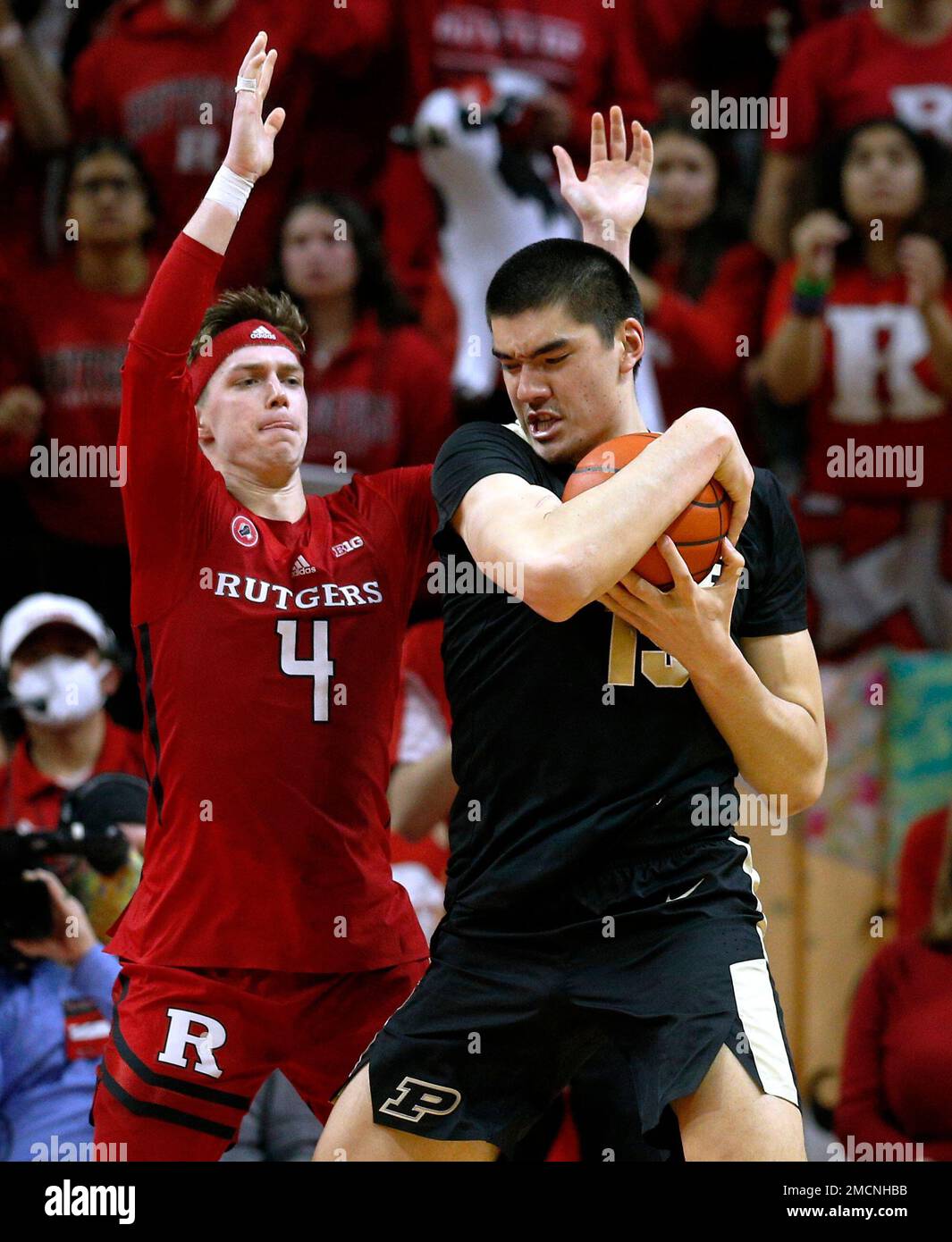 Rutgers guard Paul Mulcahy (4) defends against Purdue center Zach Edey ...