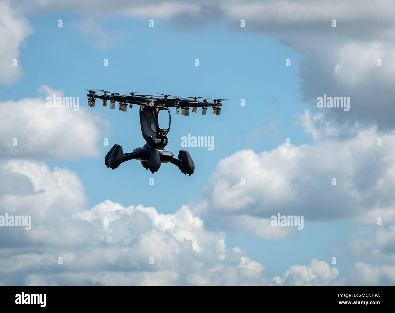 The Hexa, an electric, vertical takeoff and landing aircraft, hovers in ...