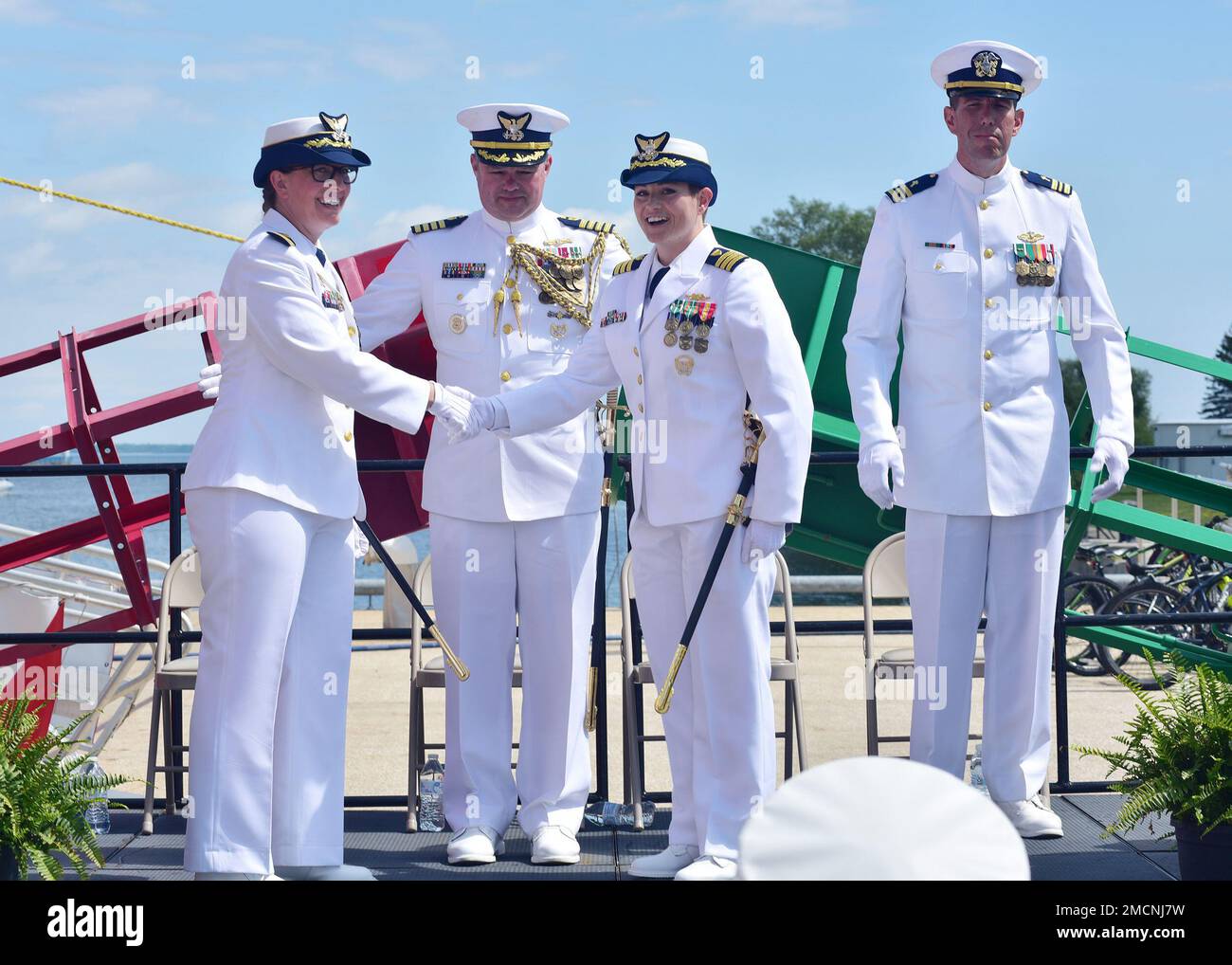 Outgoing Mackinaw commanding officer Cmdr. Kristen Serumgard, left ...