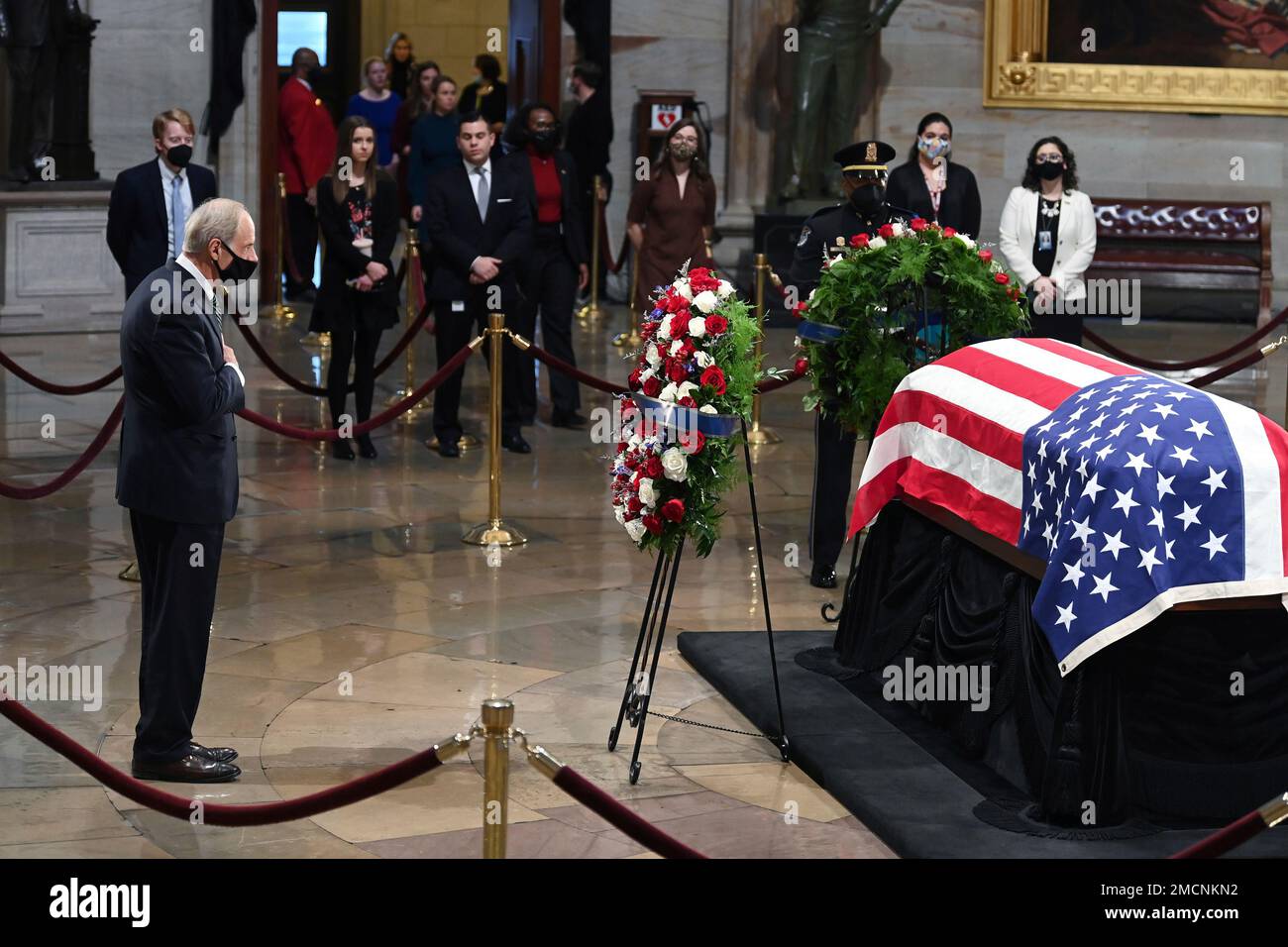 People pay their respects to former Sen. Bob Dole of Kansas, who lies ...