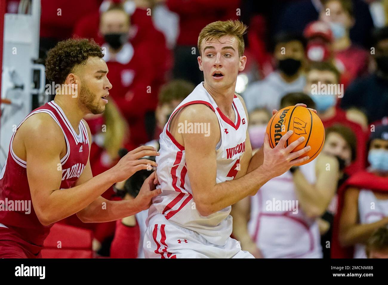 Wisconsin's Tyler Wahl (5) against Indiana's Parker Stewart (45) during ...