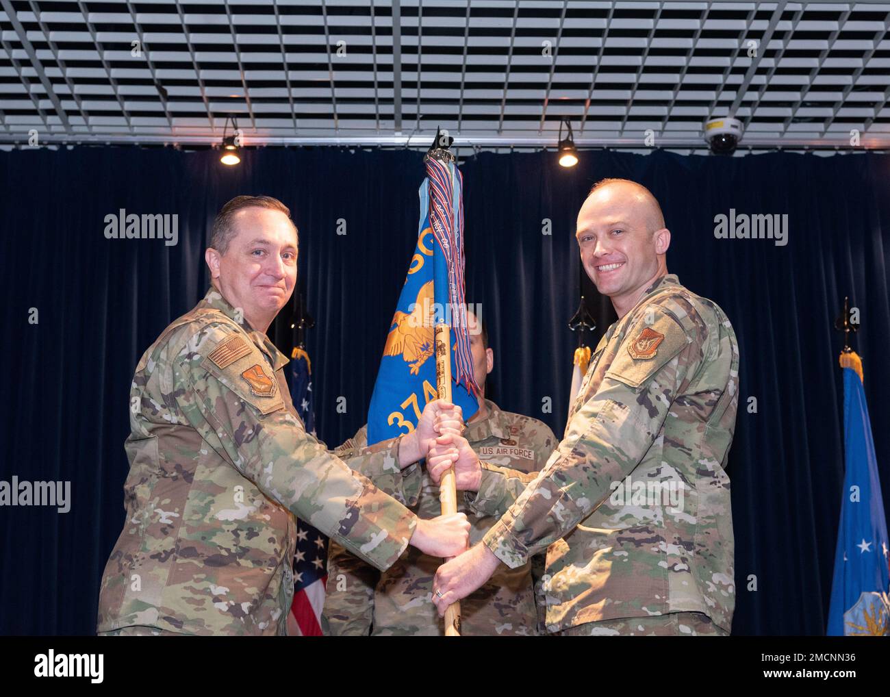 Maj. Jordan Hayes, right, 374th Force Support Squadron incoming ...
