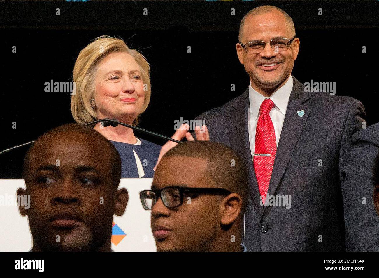 FILE - Democratic presidential candidate Hillary Clinton, left, stands ...