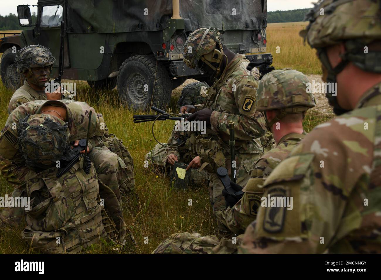 U.S. Army paratroopers assigned to A Battery, 4th Battalion, 319th Field Artillery Regiment ...