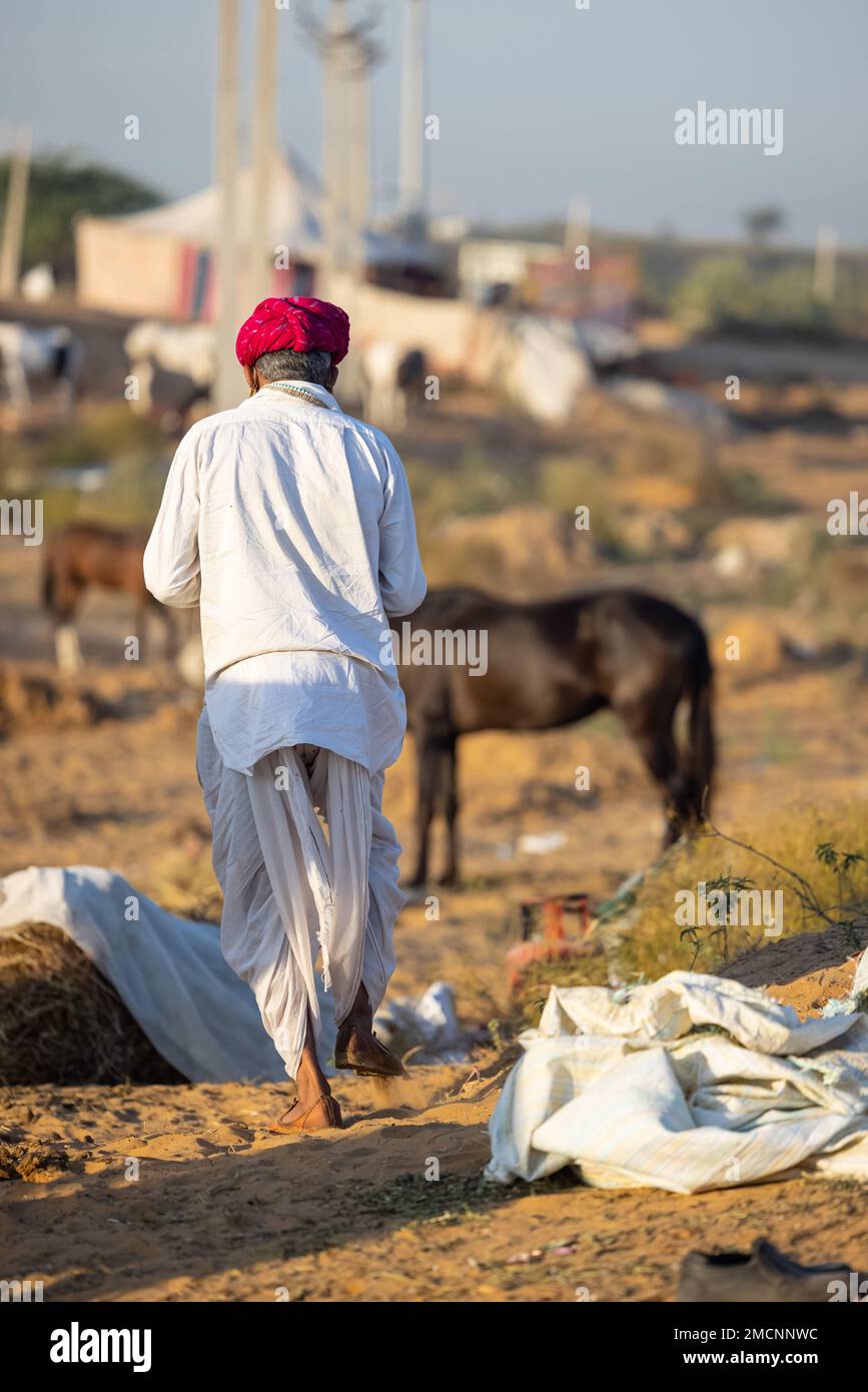 Pushkar, India - Oct 2022: Pushkar Fair, Portrait of an camel trader in ...