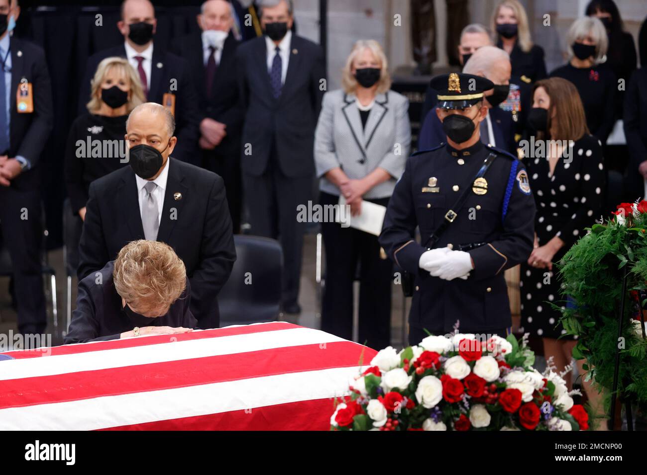 Former Sen. Elizabeth Dole cries at the casket of her husband, former ...
