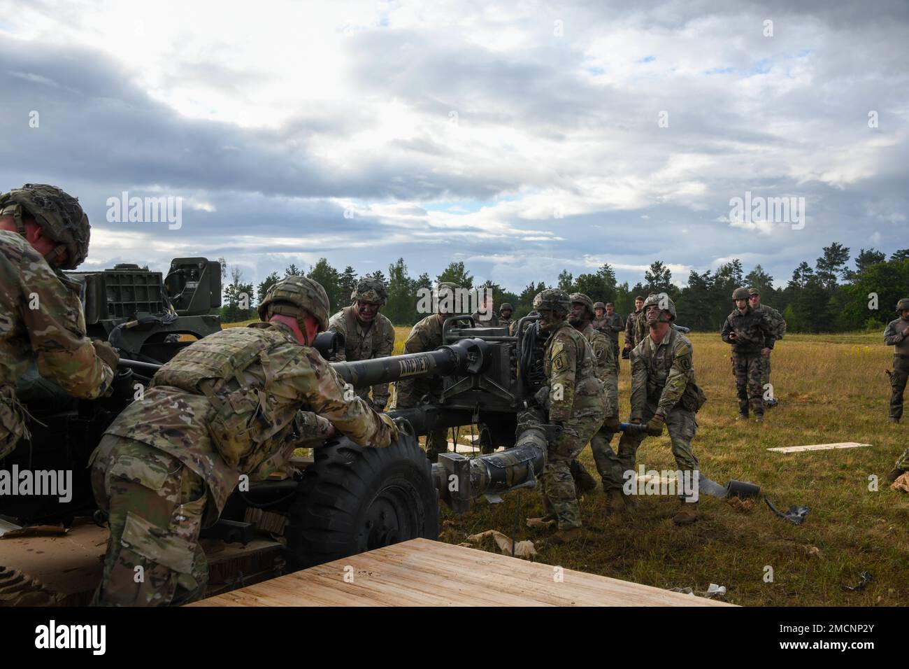 U.S. Army paratroopers assigned to A Battery, 4th Battalion, 319th Field Artillery Regiment ...