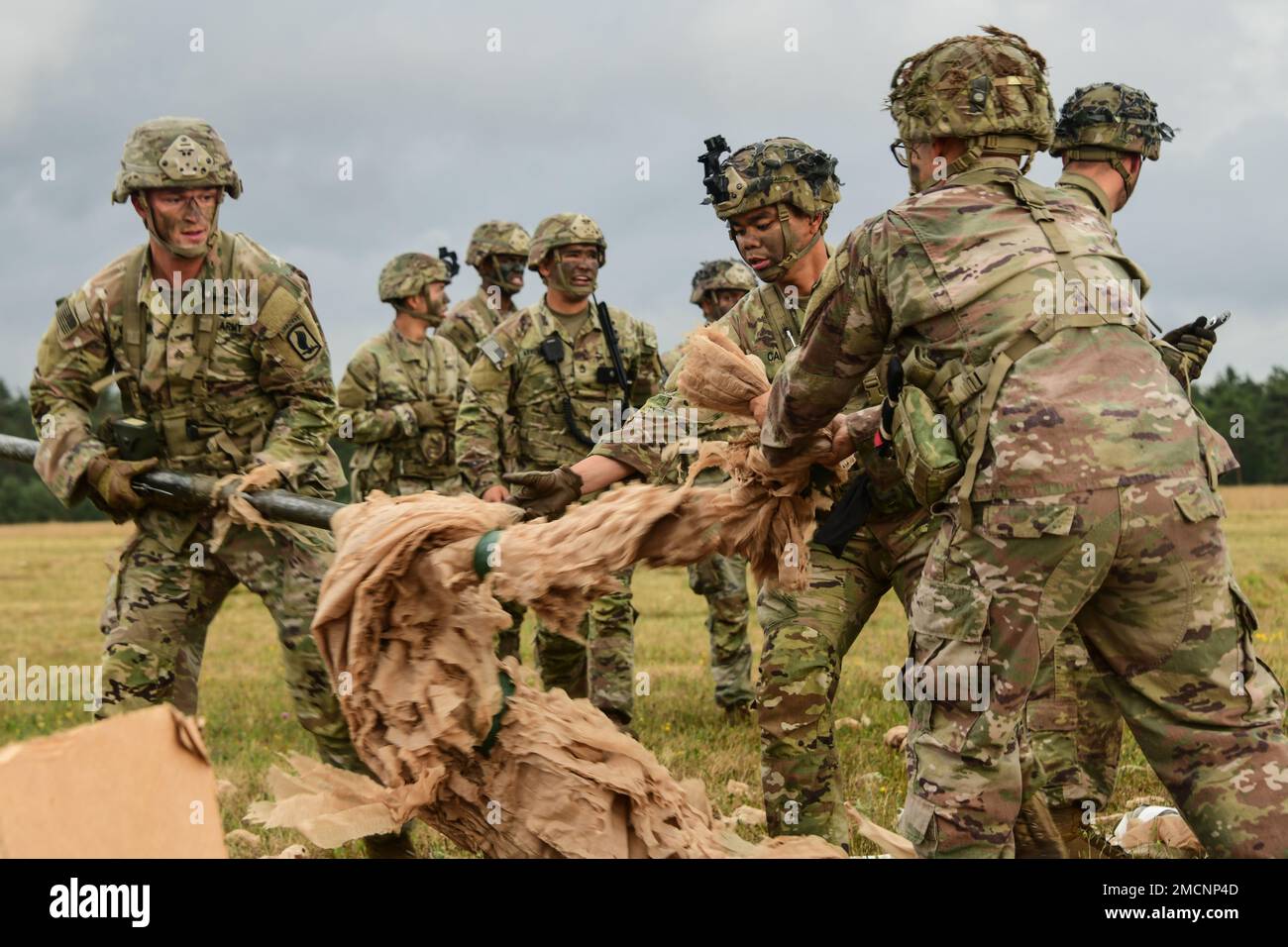U.S. Army paratroopers assigned to A Battery, 4th Battalion, 319th Airborne Field Artillery ...