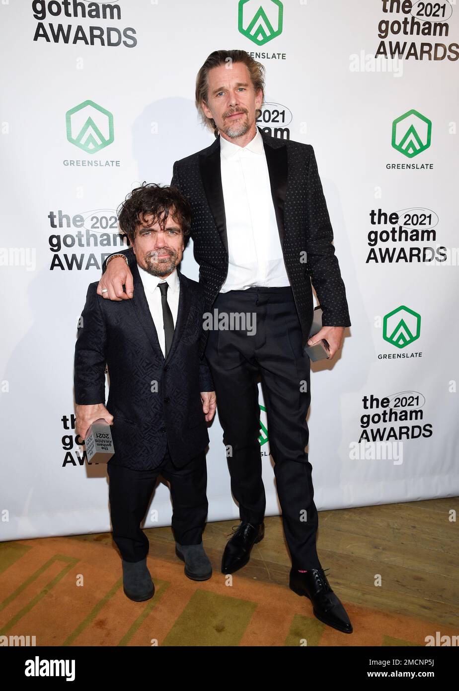 Peter Dinklage, left, and Ethan Hawke pose together in the winters room ...
