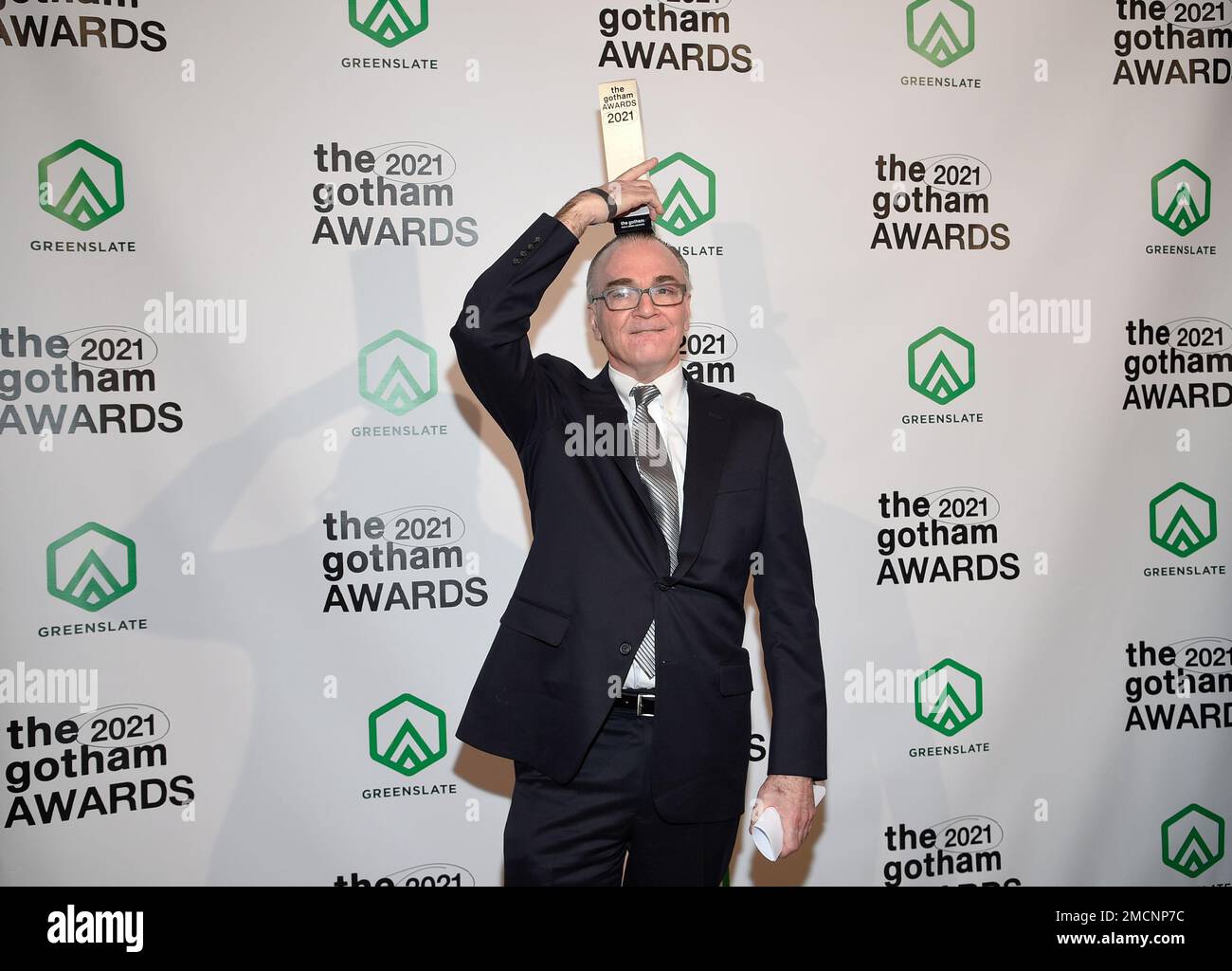 Eamonn Bowles poses with the industry tribute award at the Gotham ...